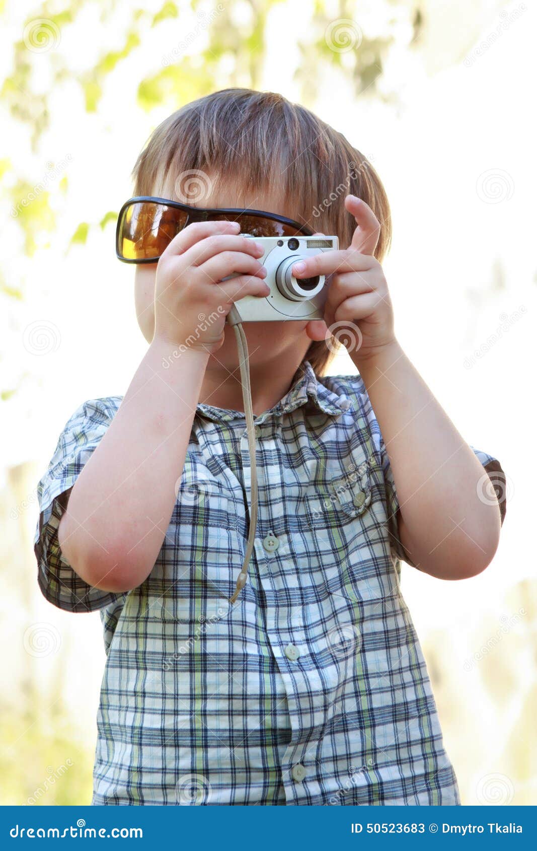 Boy with digital camera stock image. Image of camera - 50523683