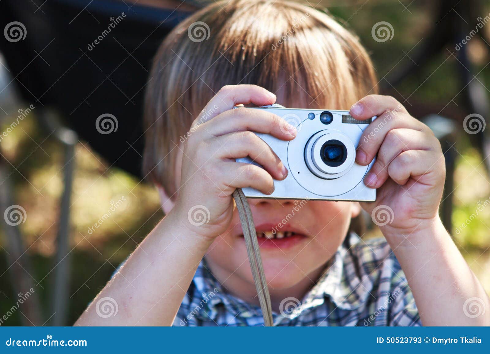 Boy with digital camera stock image. Image of sunglasses - 50523793