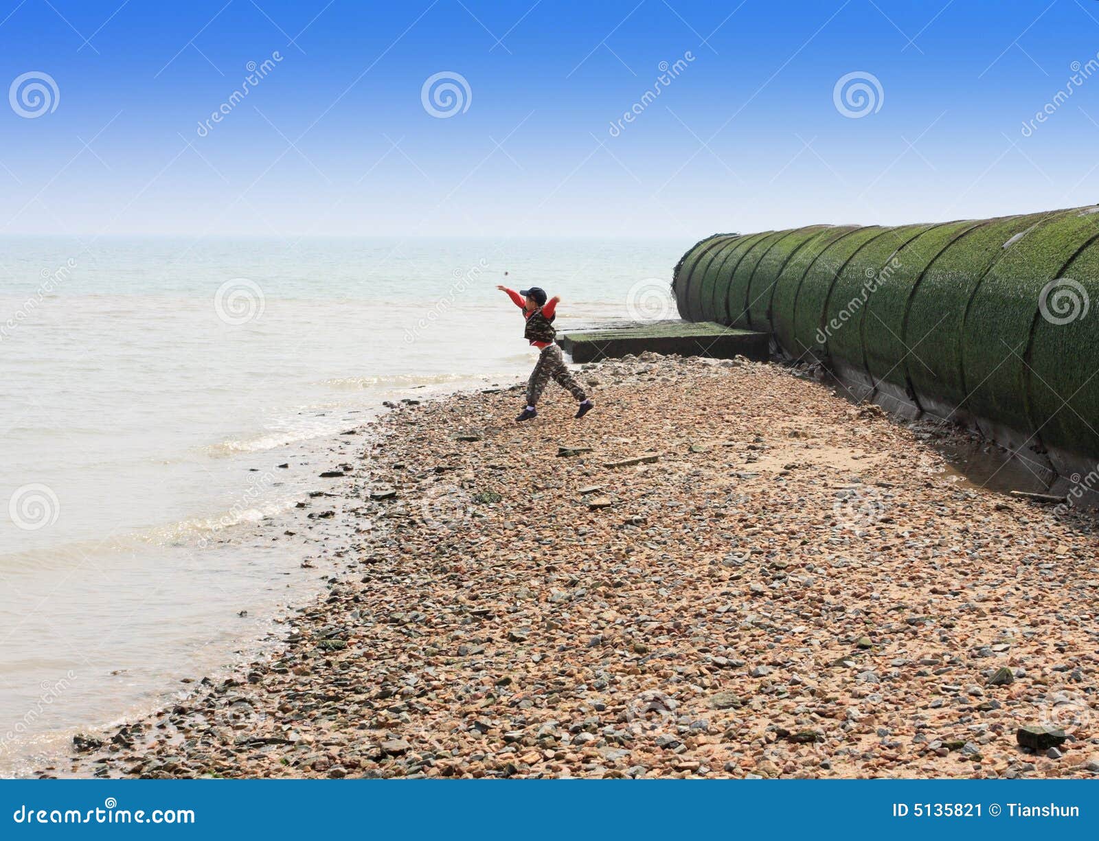 Boy And Discard Pipe Picture. Image: 5135821