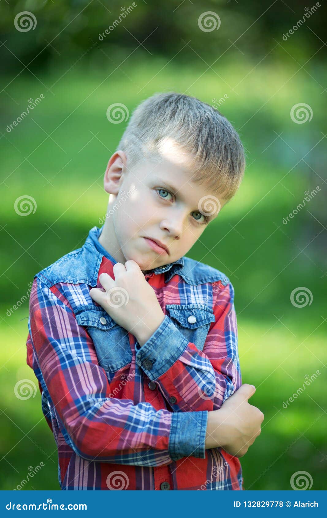 Boy with a Displeased Facial Expression Stock Photo - Image of portrait ...