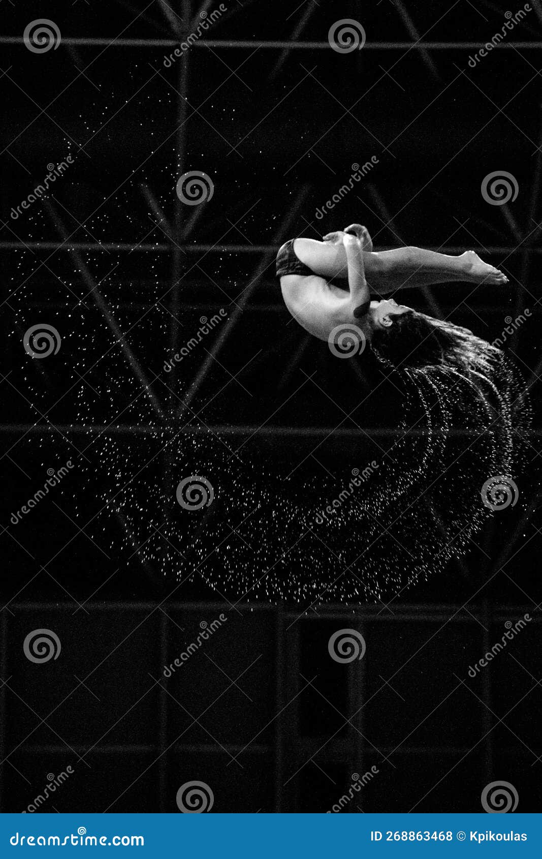 A boy diver performs editorial stock photo. Image of shadow - 268863468