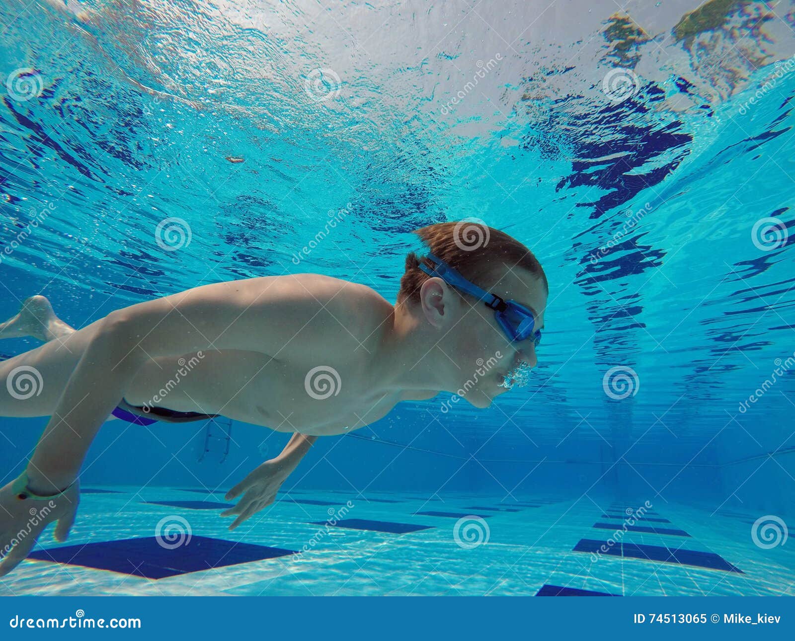 Boy Diving into a Swimming Pool Stock Image - Image of summer, goggles ...