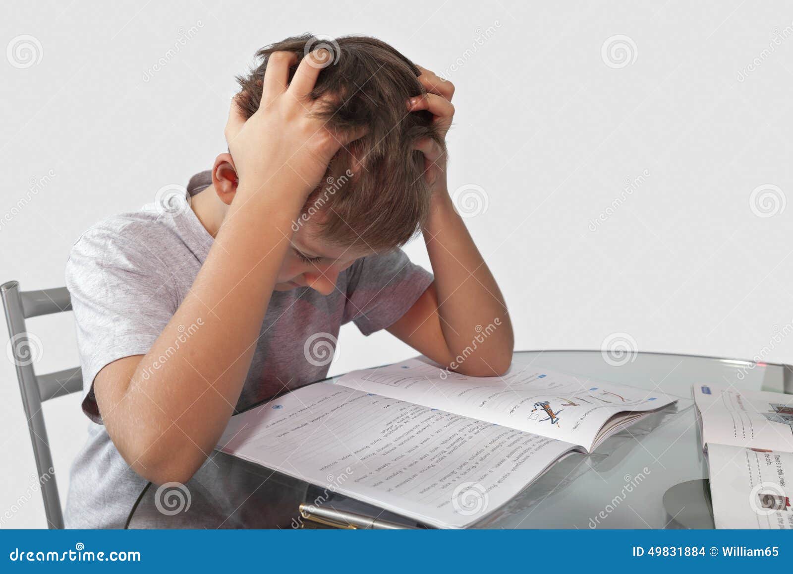Boy Does His Homework on a Glass Table Stock Photo - Image of learn ...