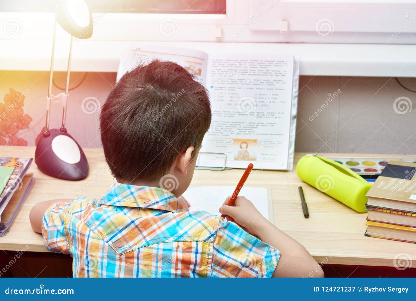 Boy Does His Homework at Table Stock Image - Image of school, interior ...