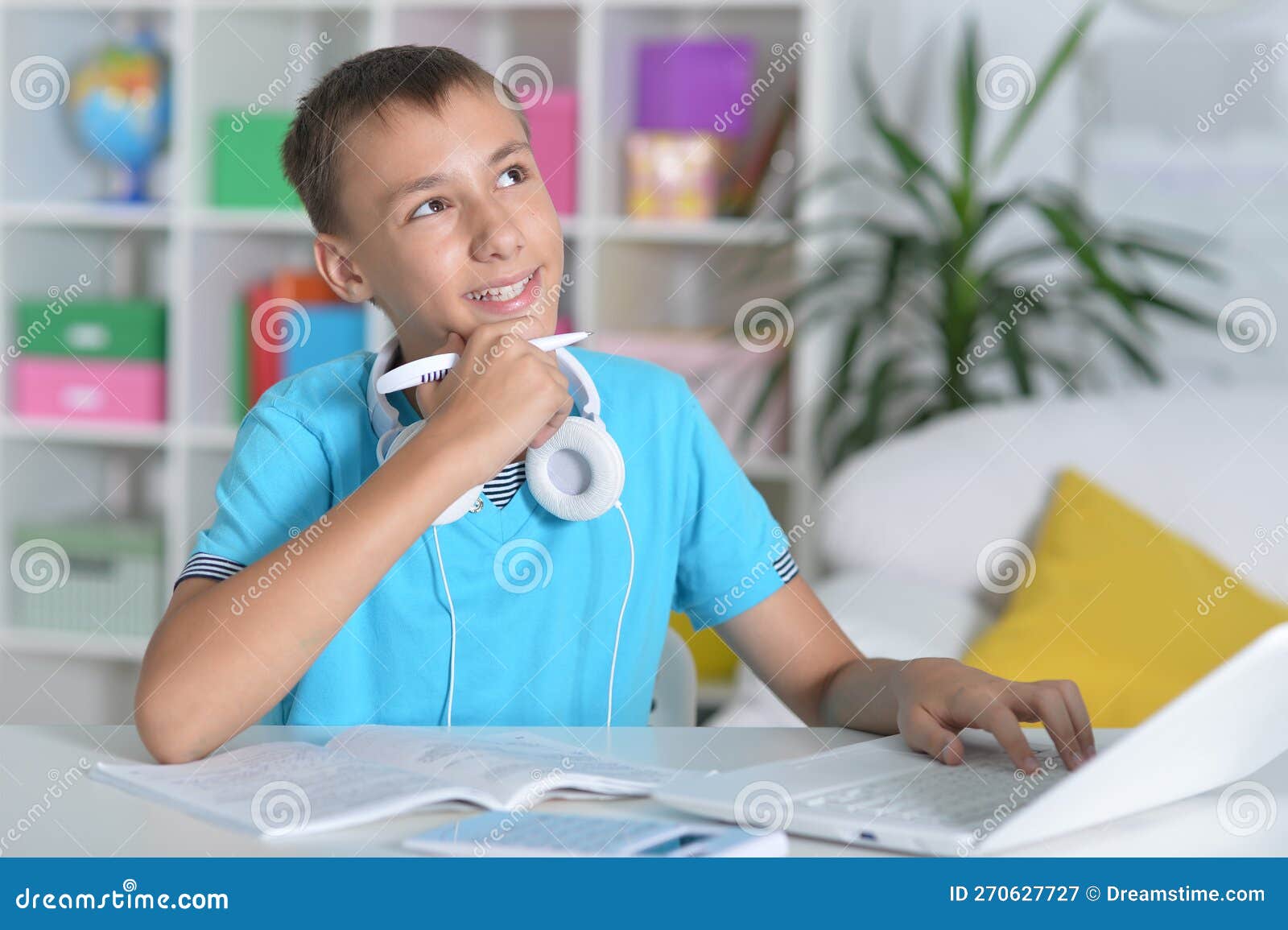 Boy Does Homework with a Laptop at a Desk Stock Image - Image of manner ...