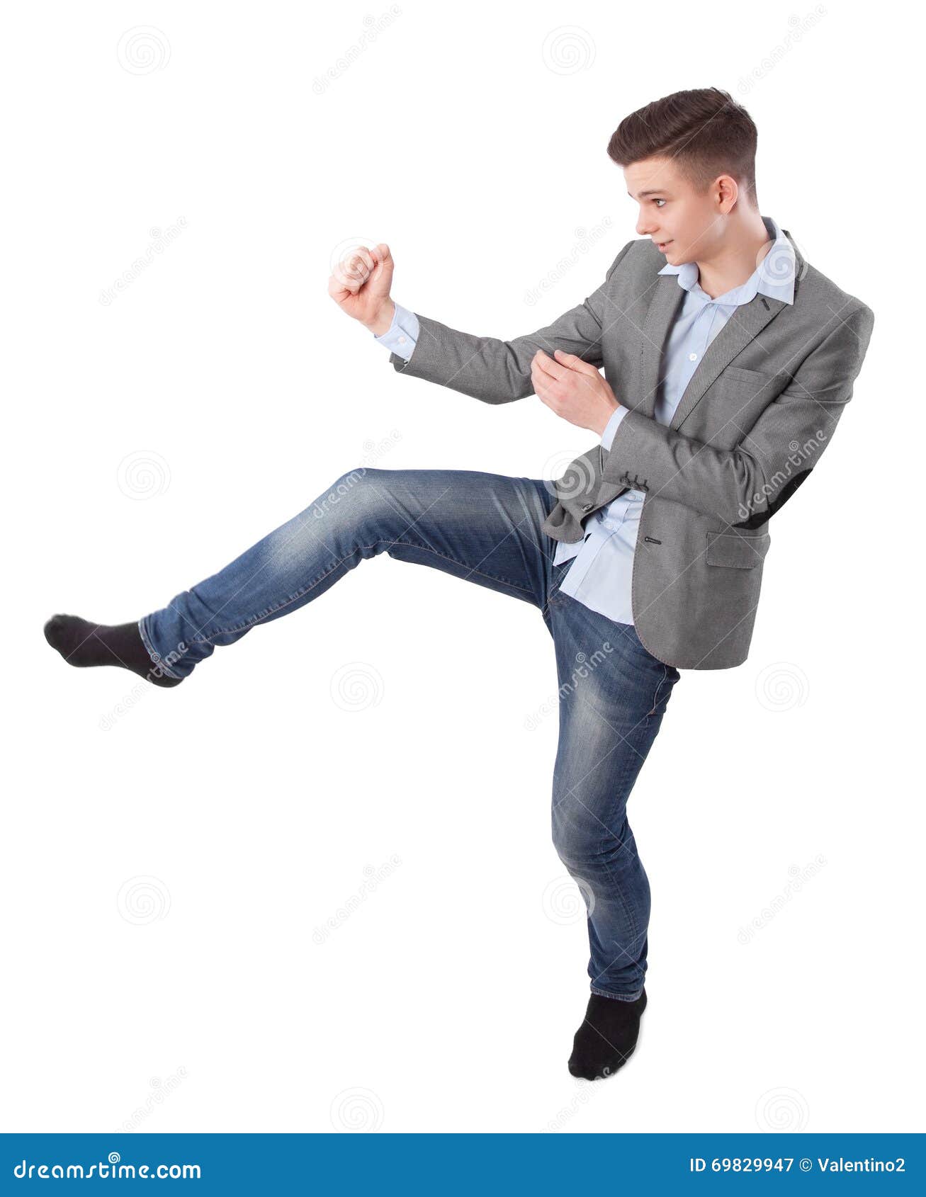 Boy does karate kick stock image. Image of young, punching - 69829947