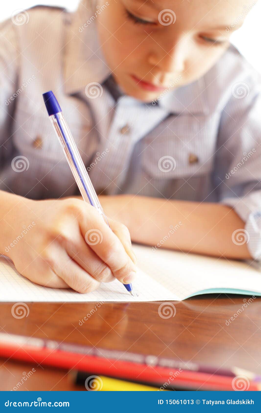 Boy does a lesson stock image. Image of paper, preschooler - 15061013