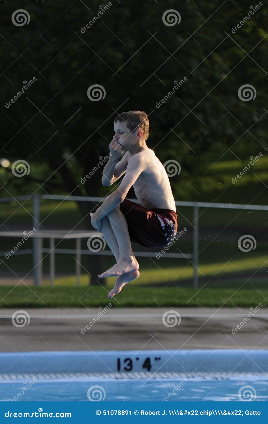 Boy doing cannonball stock image. Image of swimming, dive - 51078891
