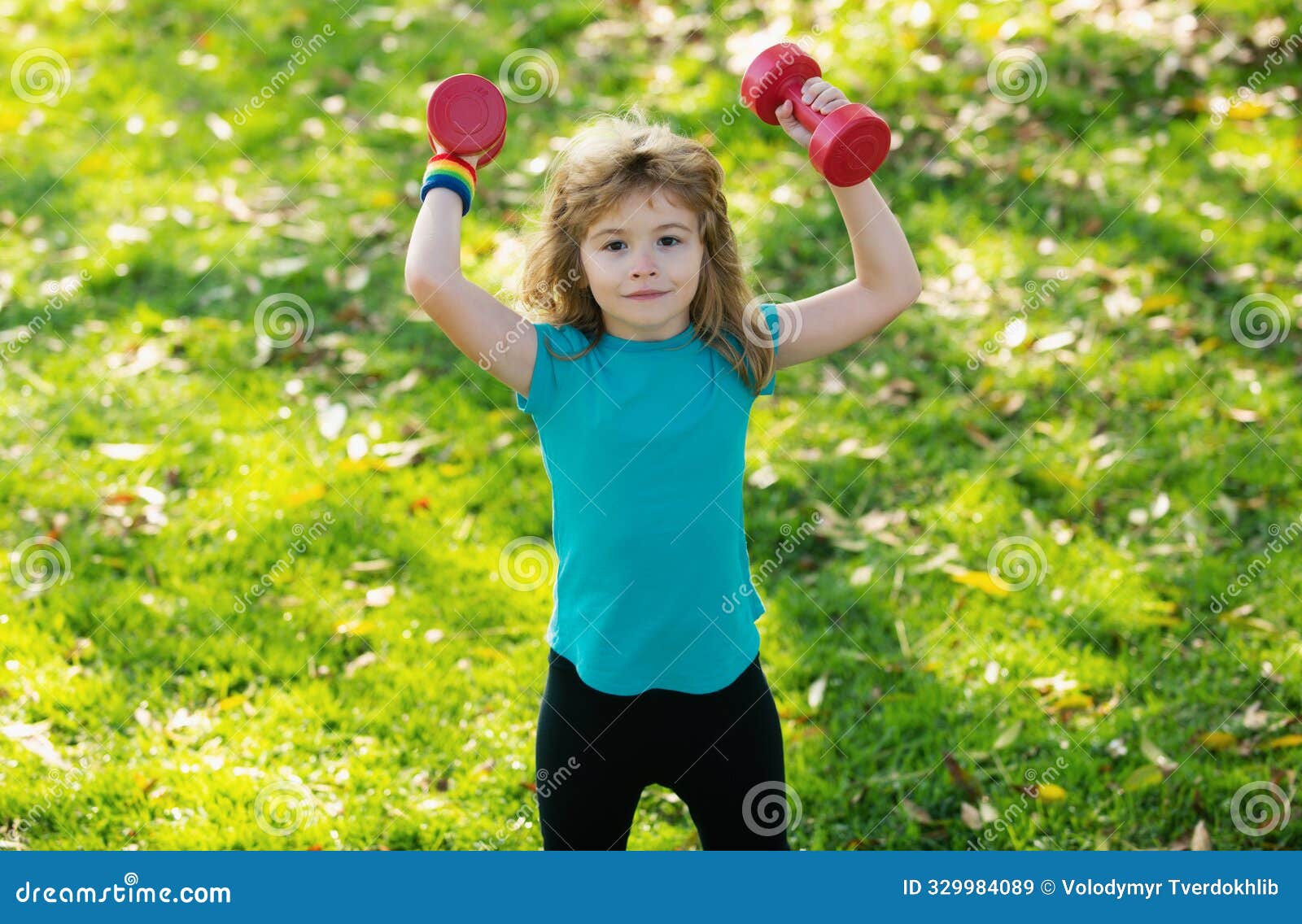 Boy is Doing Exercises To Develop Muscles. Child is Doing Exercises ...