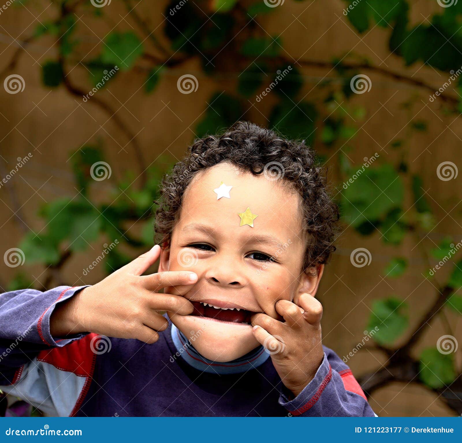 Boy doing funny face stock image. Image of cheerful - 121223177