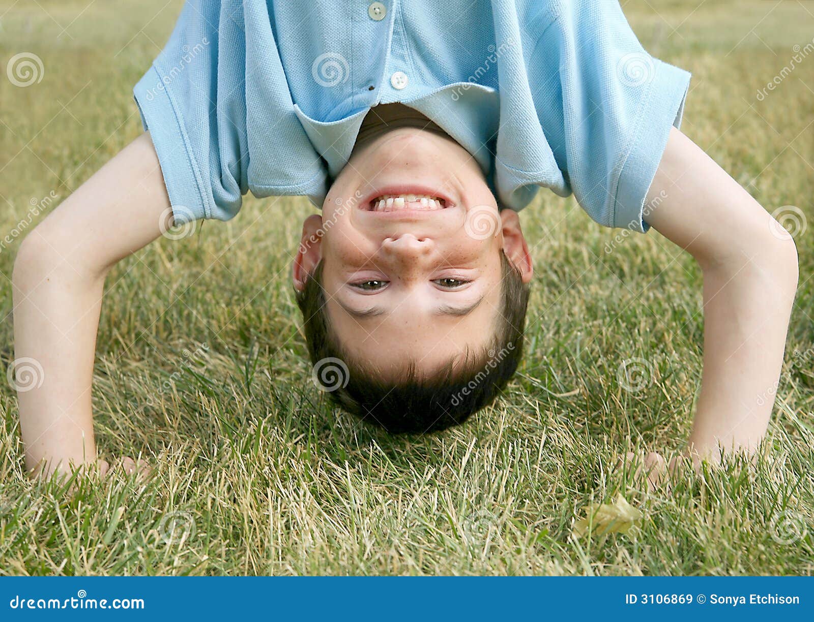 Boy Doing a Handstand stock image. Image of handsome, child - 3106869