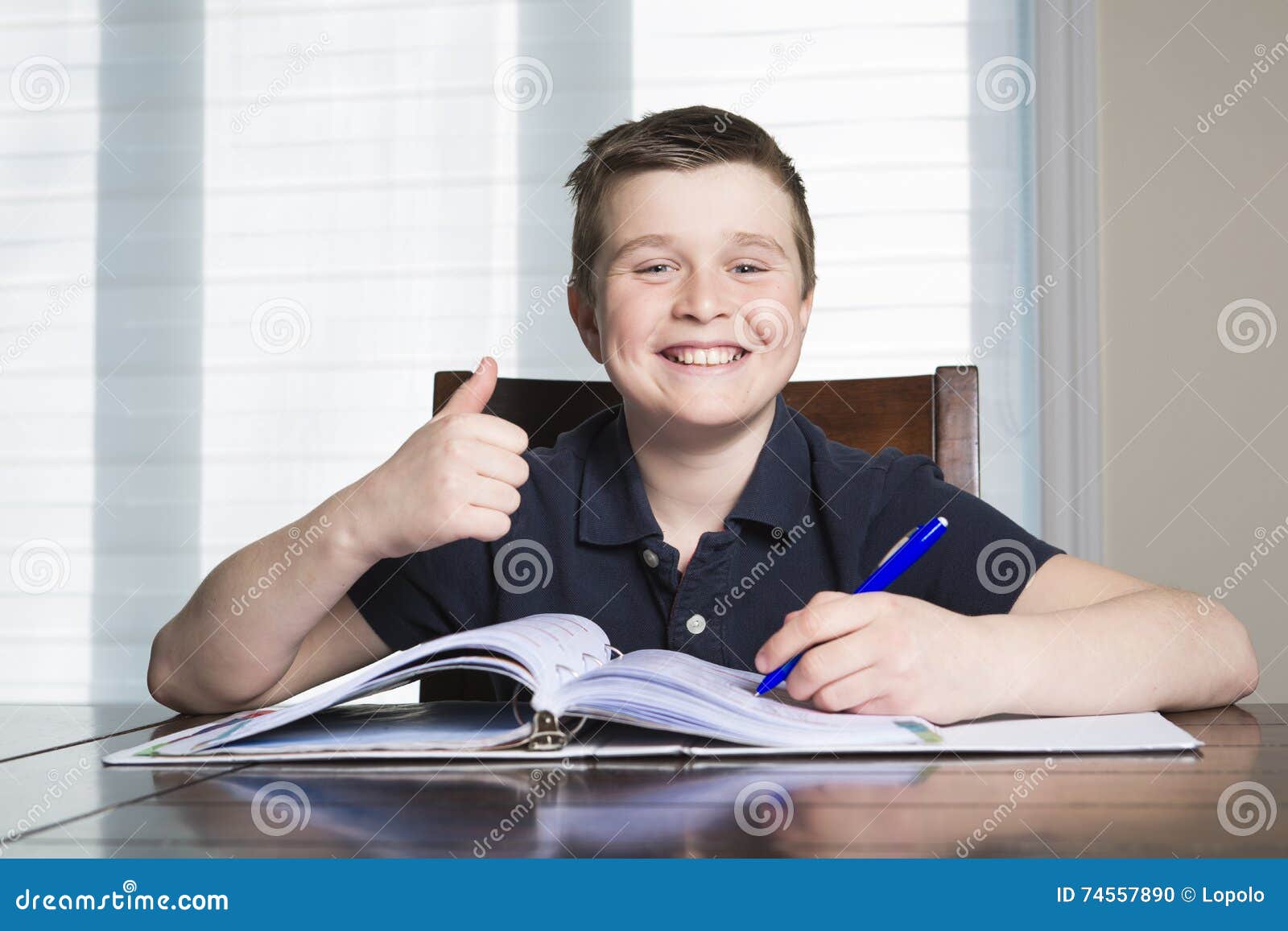 Boy Doing His Homework at Home Stock Photo - Image of book, elementary ...
