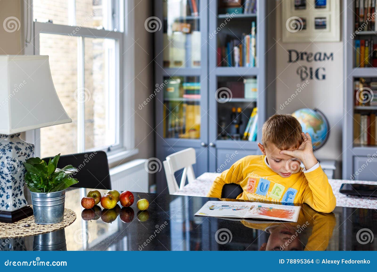 Boy doing his homework stock photo. Image of male, elementary - 78895364