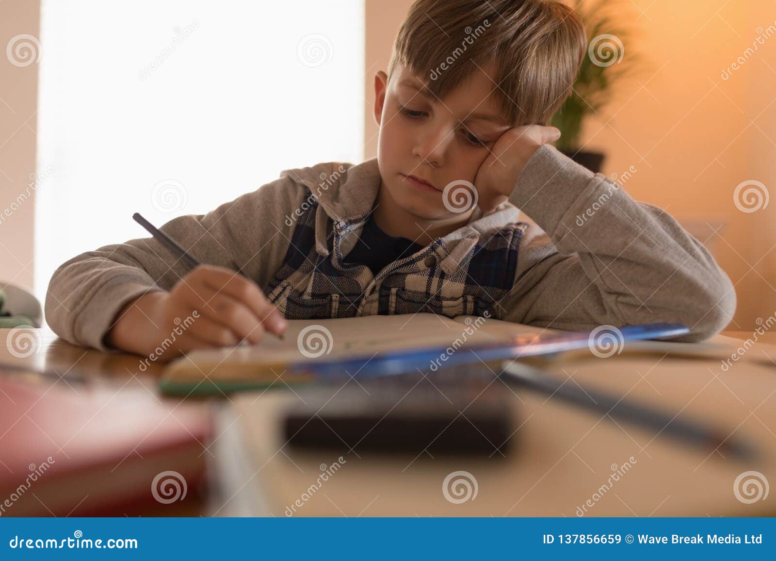 Boy Doing His Homework at Home Stock Image - Image of abode, innocence ...