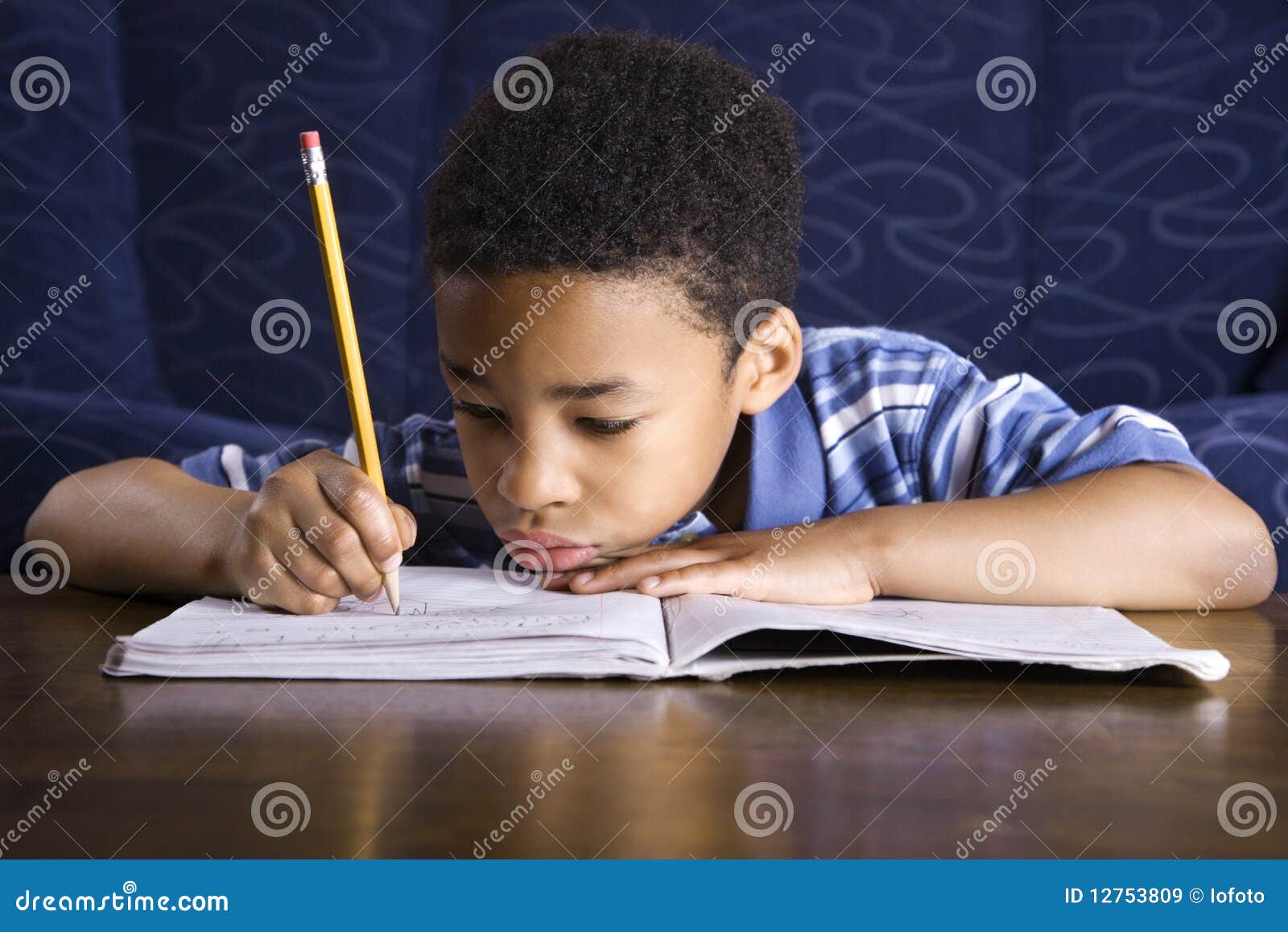 Boy Doing Homework stock image. Image of american, indoors - 12753809