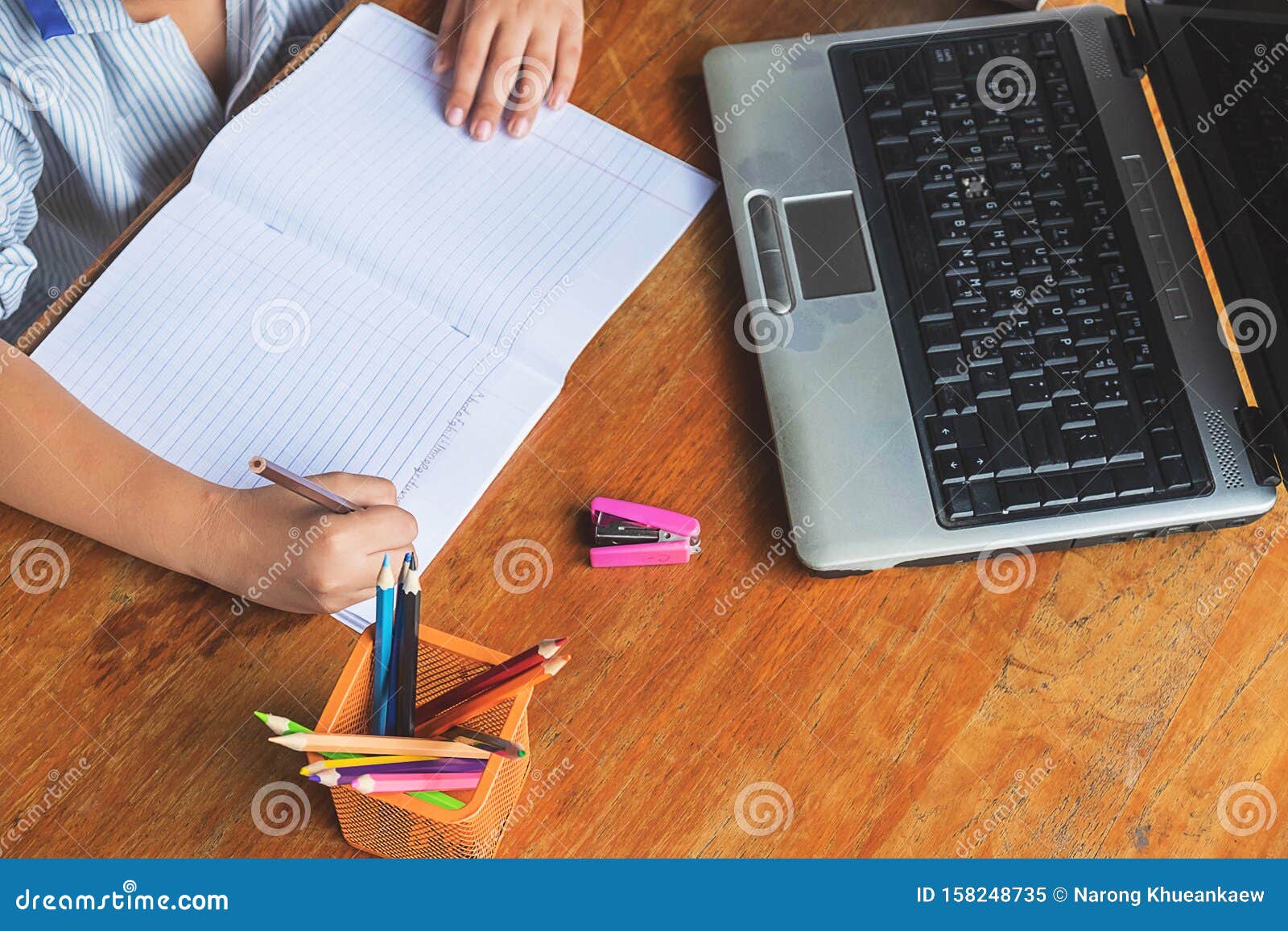 Boy doing homework stock image. Image of background - 158248735