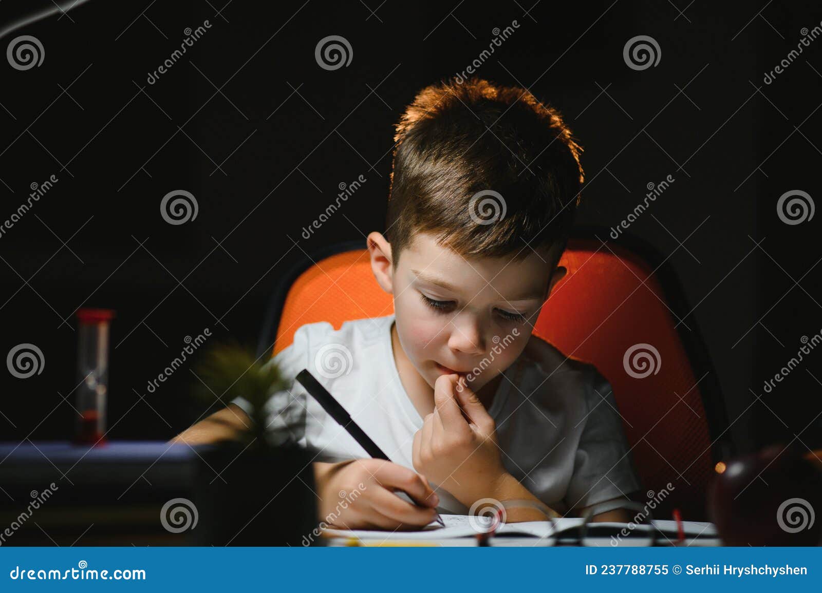 Boy Doing Homework at Home in Evening Stock Image - Image of lesson ...
