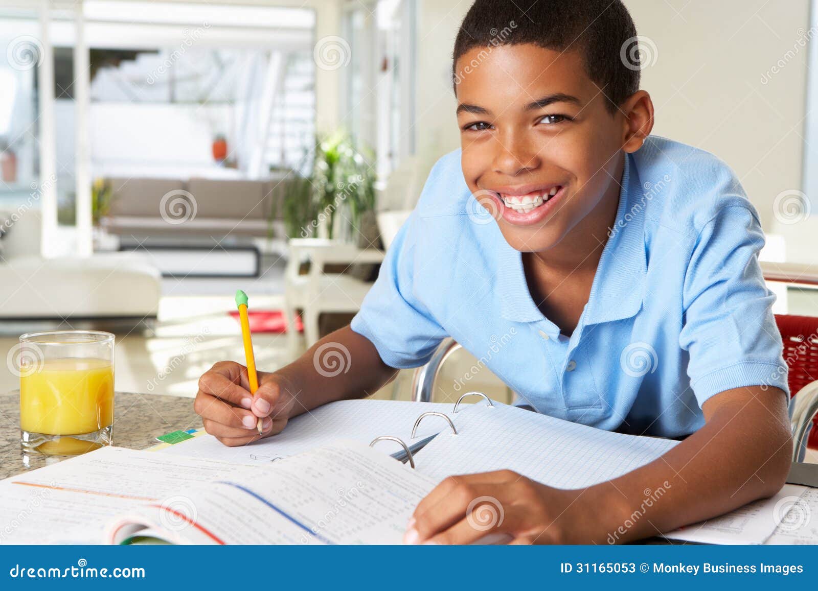 Boy Doing Homework in Kitchen Stock Image - Image of year, reading ...