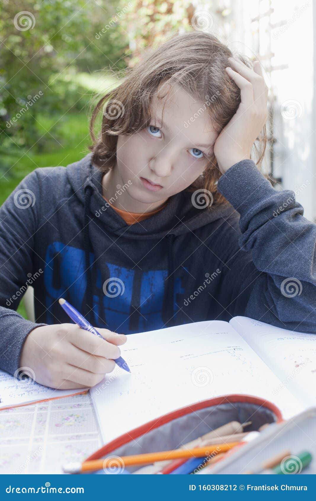 Boy Doing Homework Outdoors Stock Photo - Image of learn, workbook ...