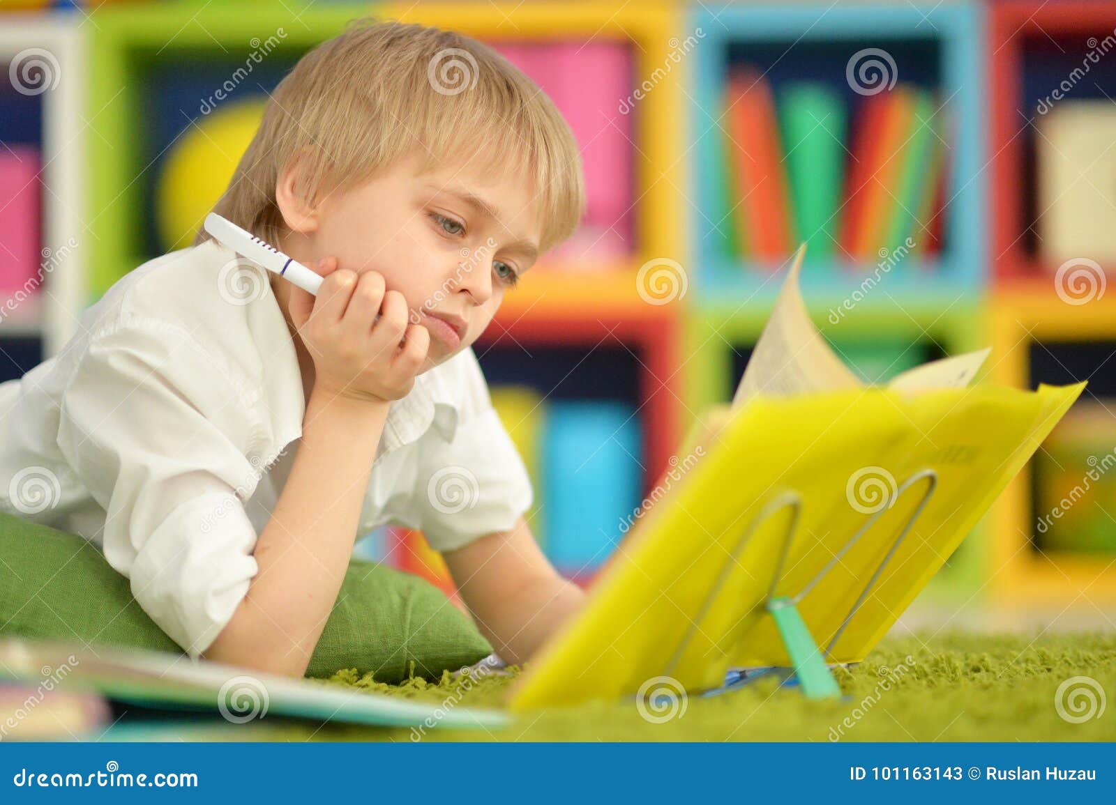Boy doing homework stock image. Image of looking, isolated - 101163143