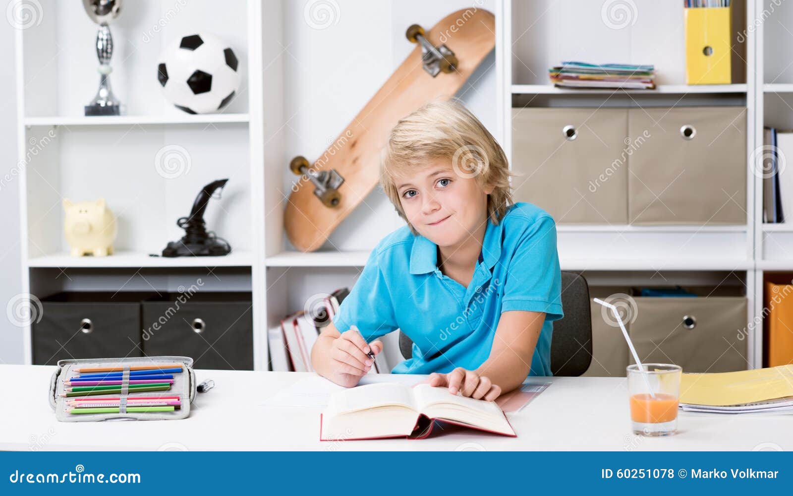 Boy Doing Homework and Reading a Book Stock Photo - Image of child ...