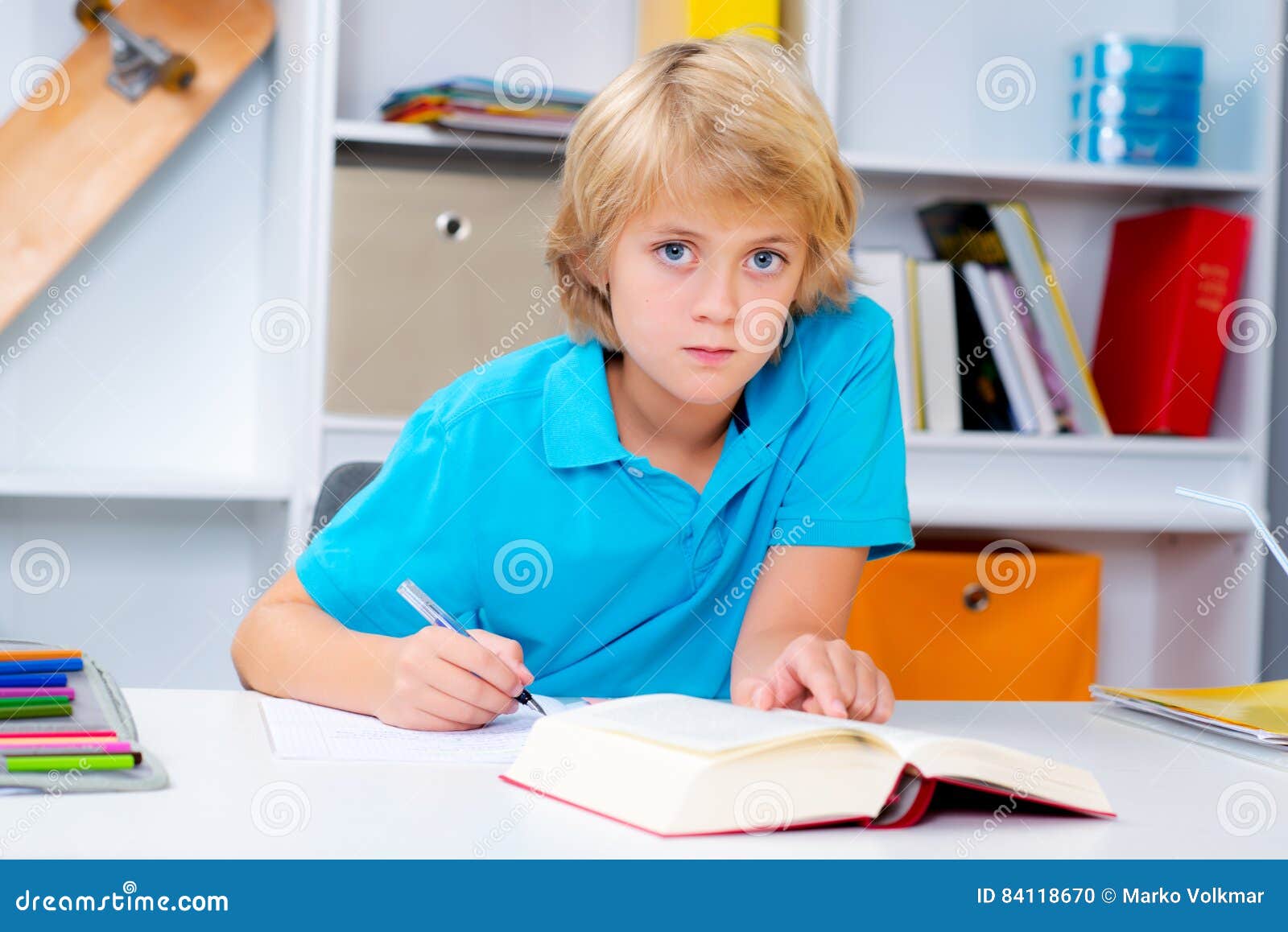 Boy Doing Homework and Reading a Book Stock Photo - Image of lesson ...