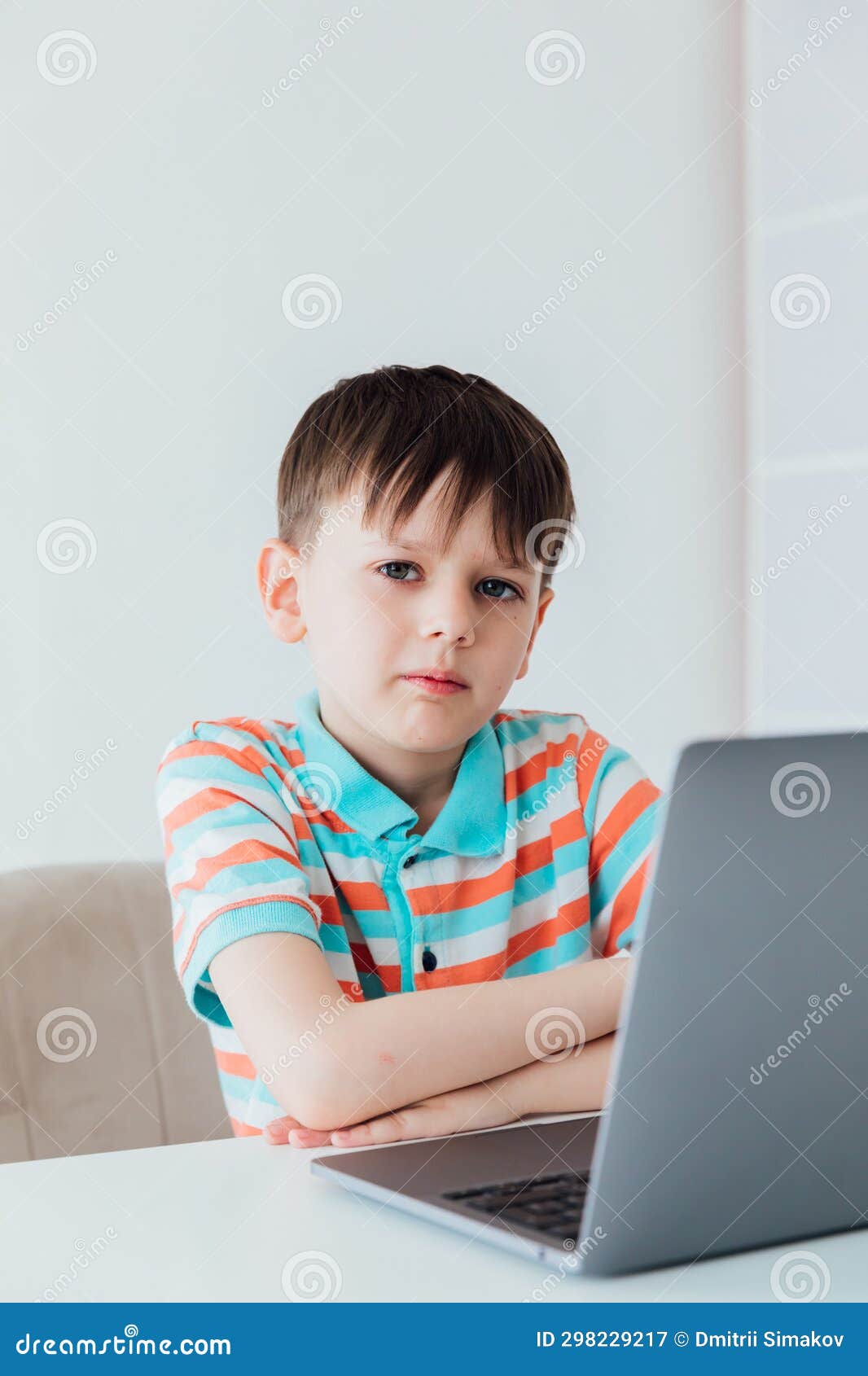 Boy Doing Homework at School on Computer Stock Image - Image of ...