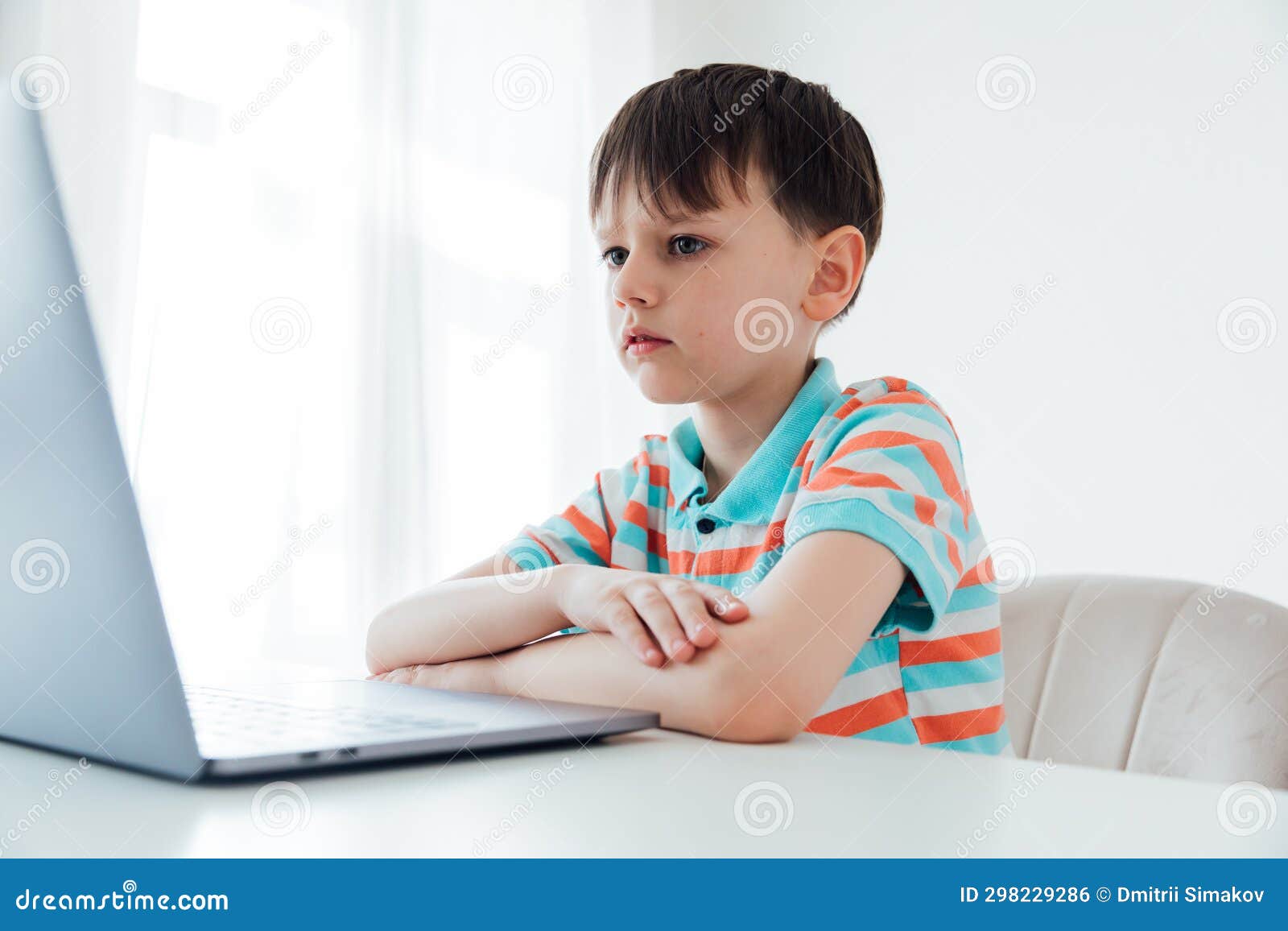 Boy Doing Homework at School on Computer Stock Photo - Image of ...