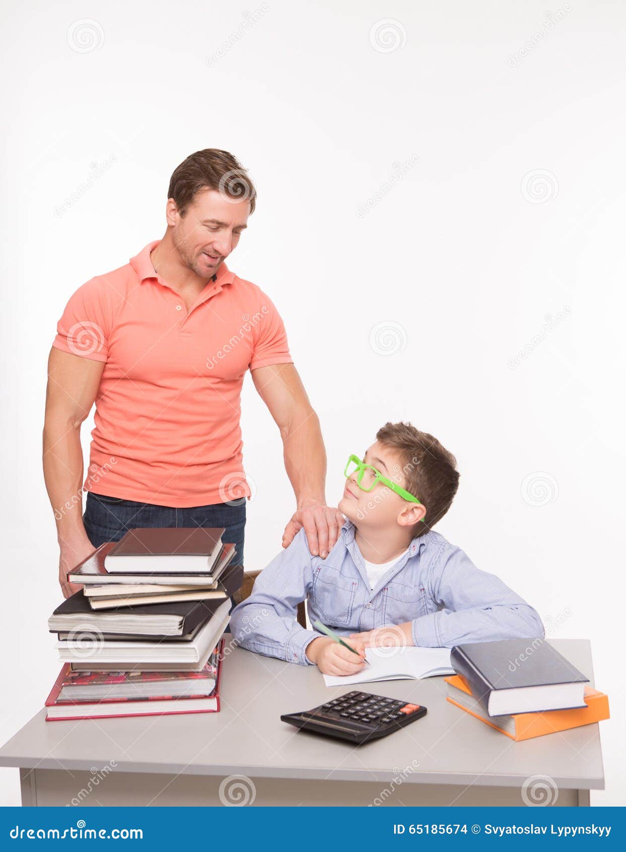 Boy Doing Homework at the Table Stock Photo - Image of child, parenting ...