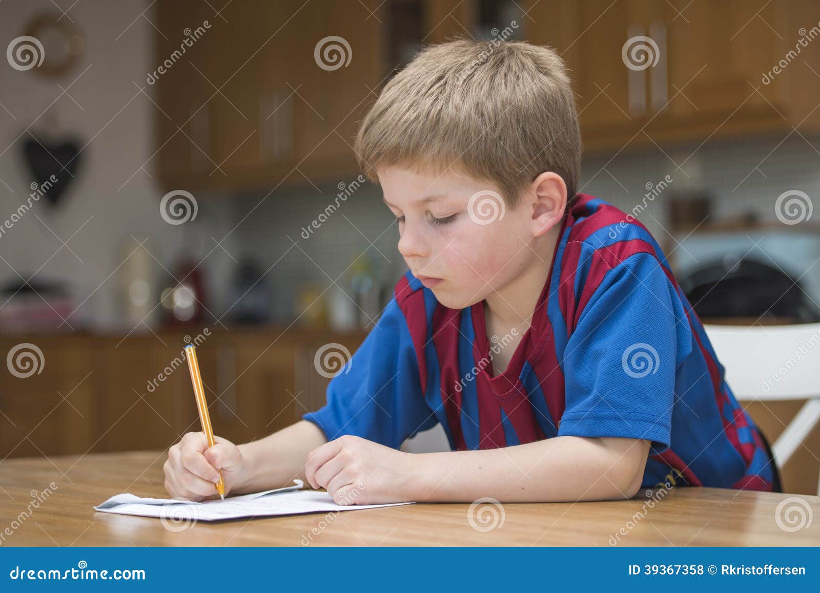 Boy doing homework stock photo. Image of writing, homework - 39367358