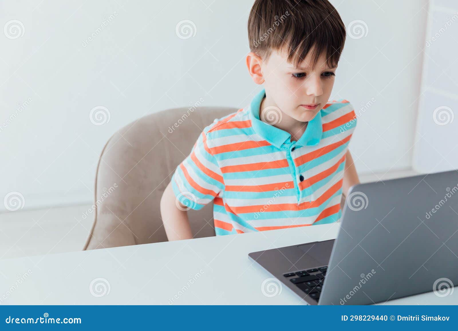 Boy Doing Learning Task at School on Computer Stock Photo - Image of ...