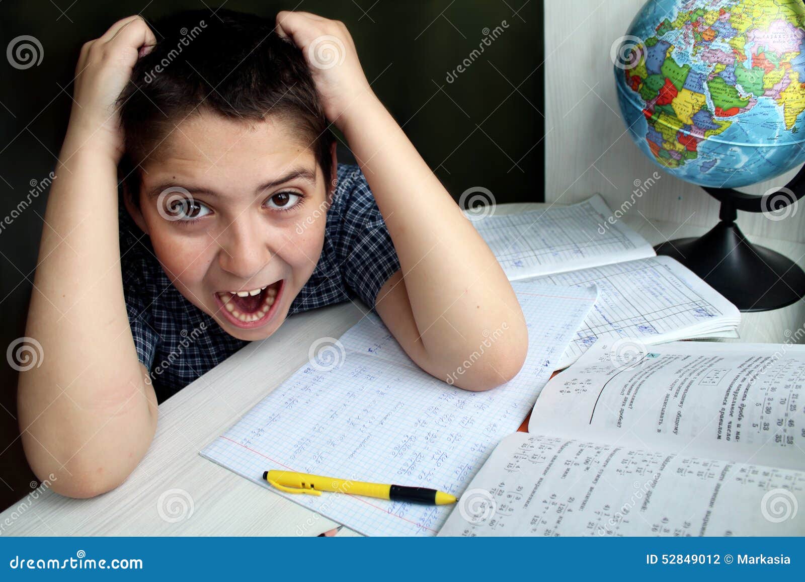 Boy doing math homework stock photo. Image of subject - 52849012