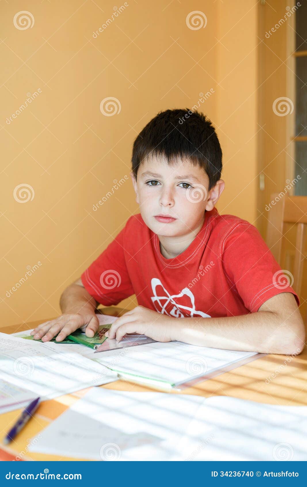Boy doing school homework stock photo. Image of library - 34236740