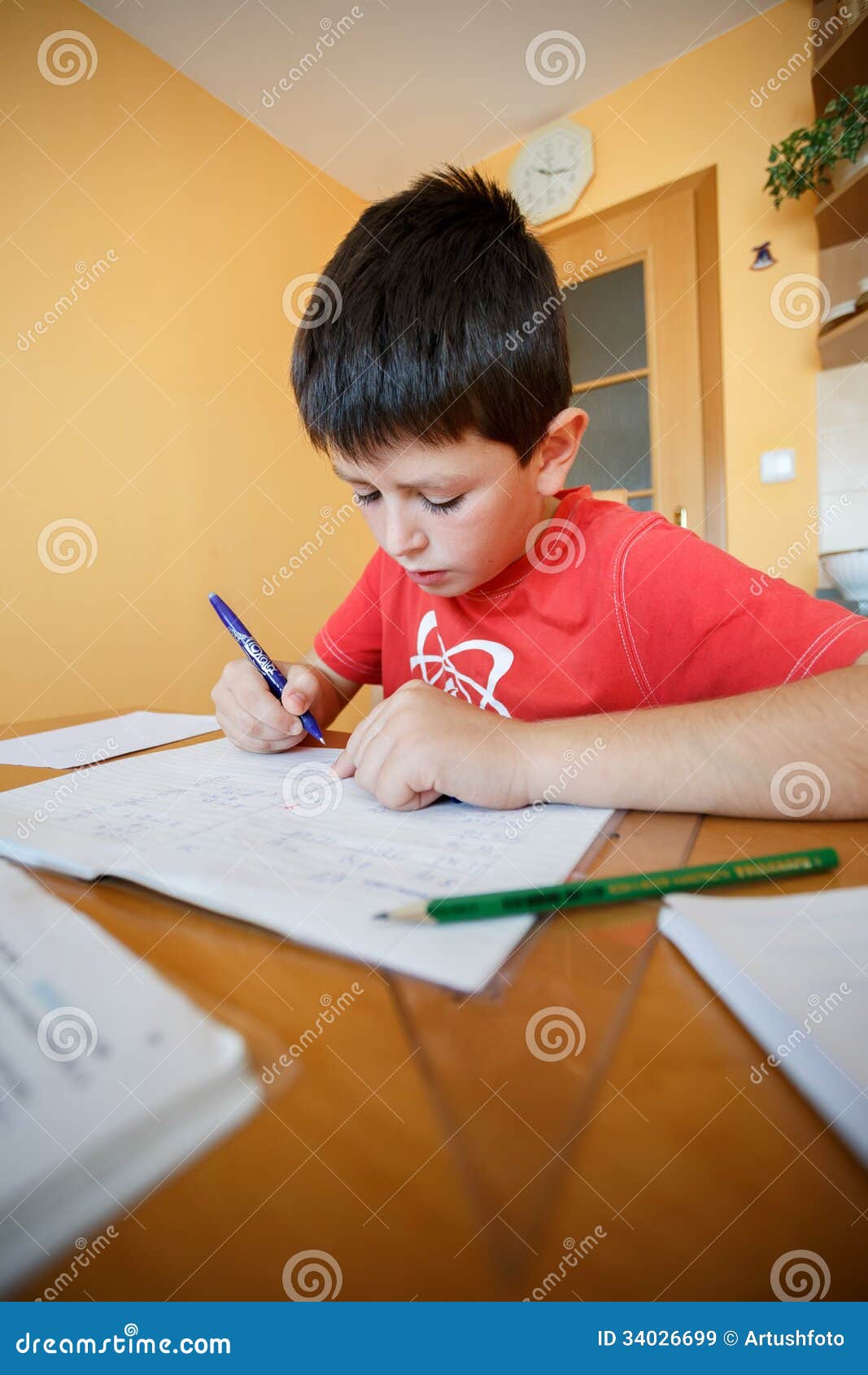 Boy doing school homework stock image. Image of expression - 34026699