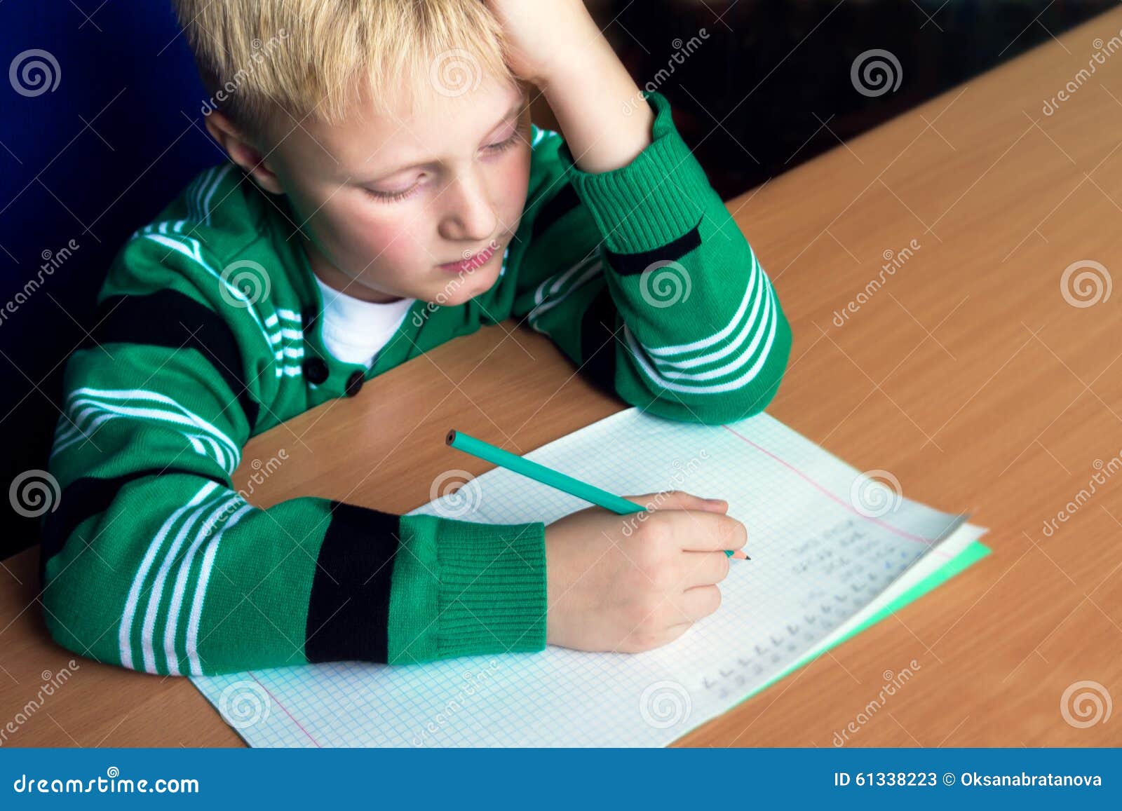 Boy doing school homework stock image. Image of home - 61338223