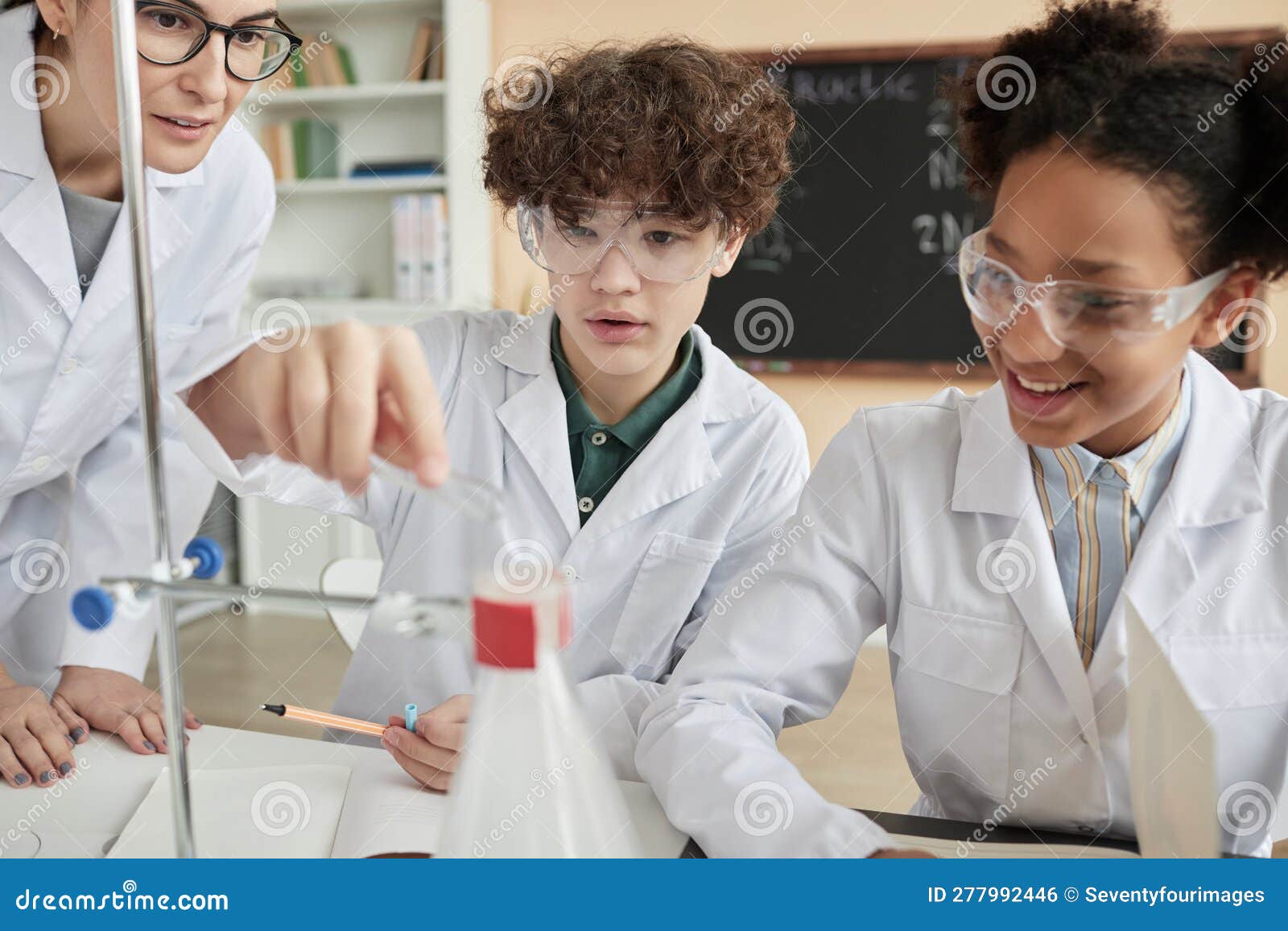 Boy Doing Science Experiment in School Classroom Stock Photo - Image of ...