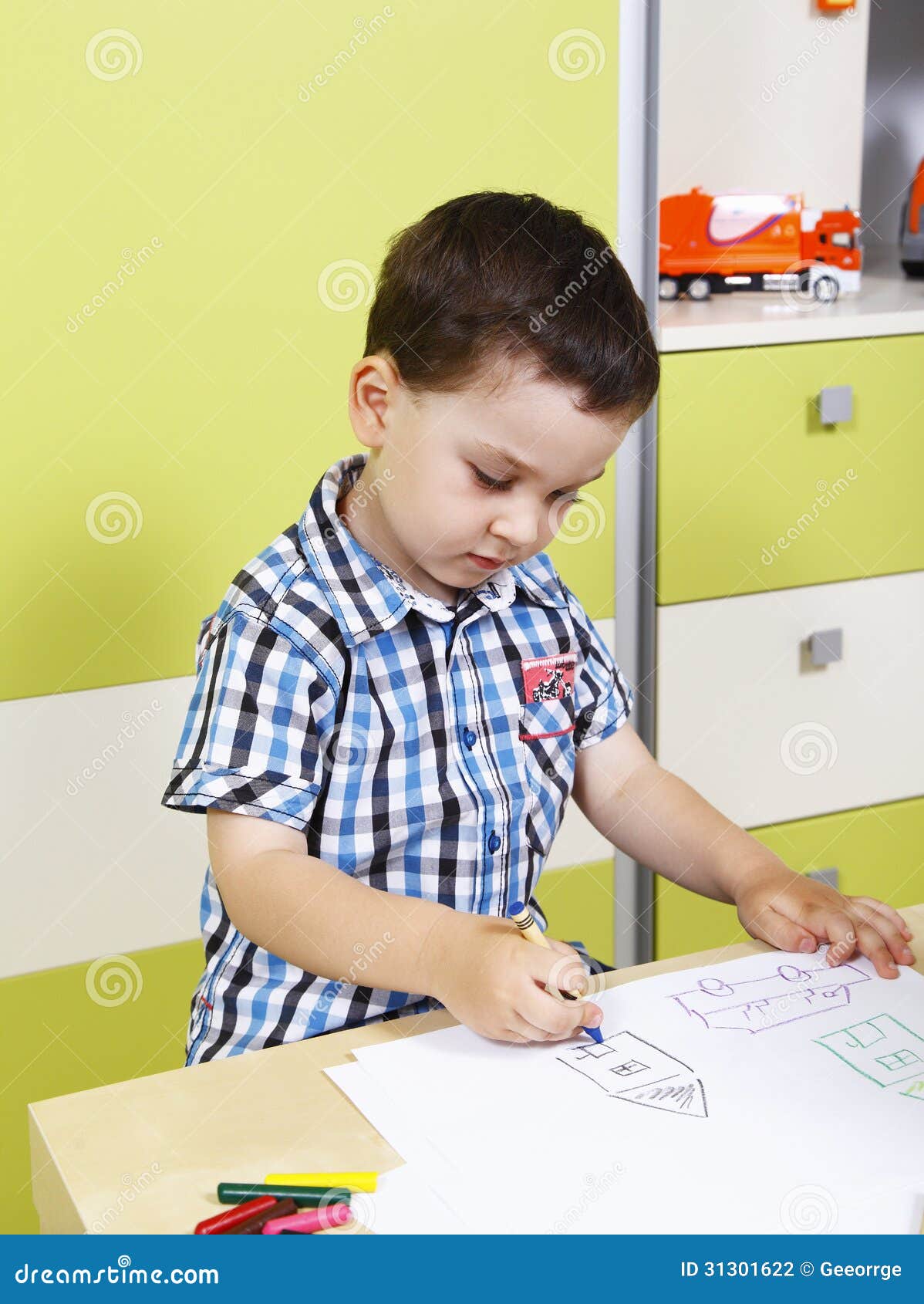 Boy drawing with crayons stock photo. Image of pencil - 31301622