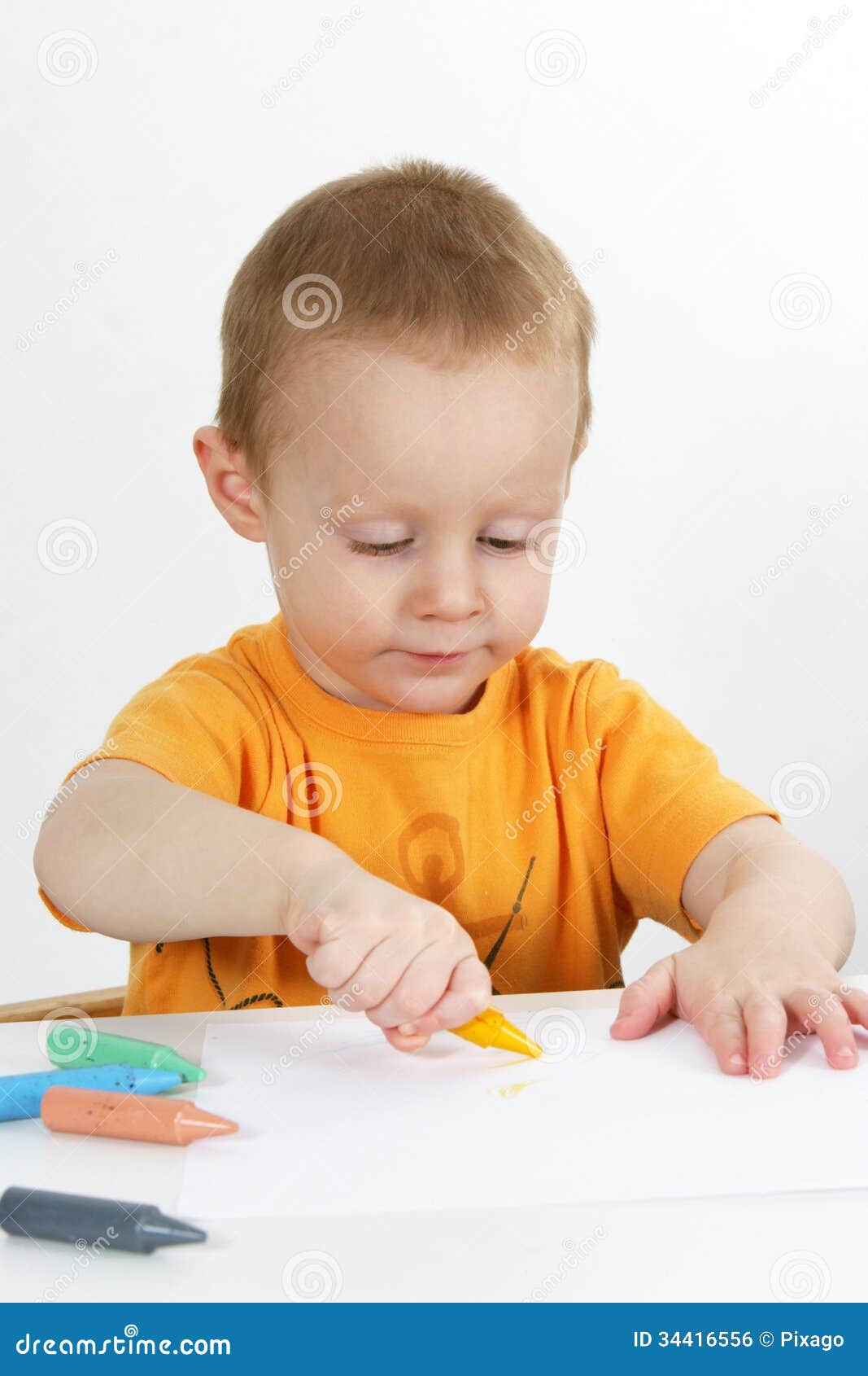 Boy drawing with crayons stock photo. Image of addiction - 34416556