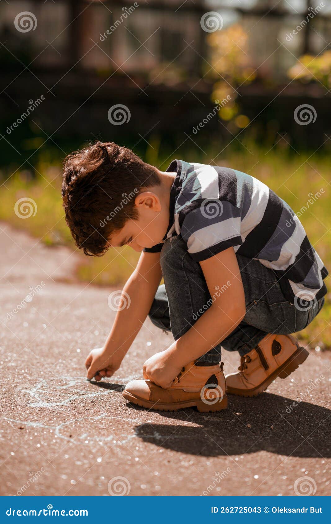 Boy Drawing Something on the Ground Stock Image - Image of igen ...
