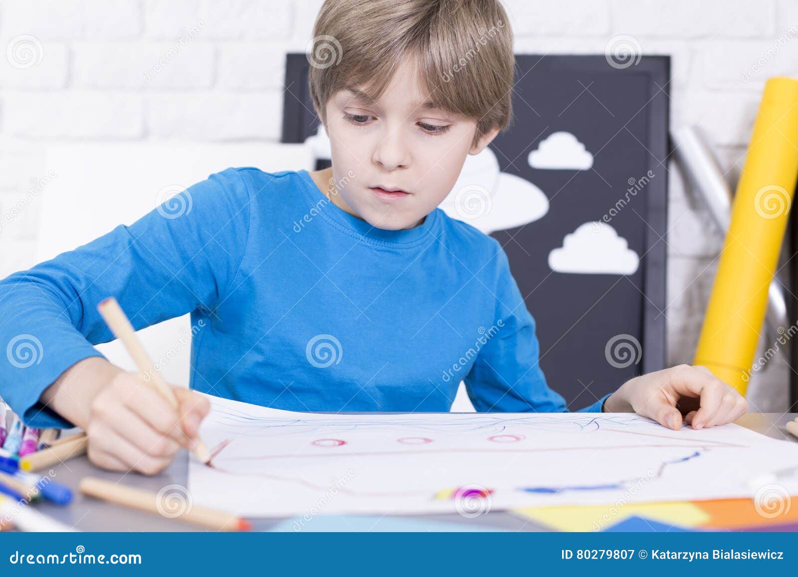 Boy Drawing Something on a Piece of Paper Stock Image - Image of ...