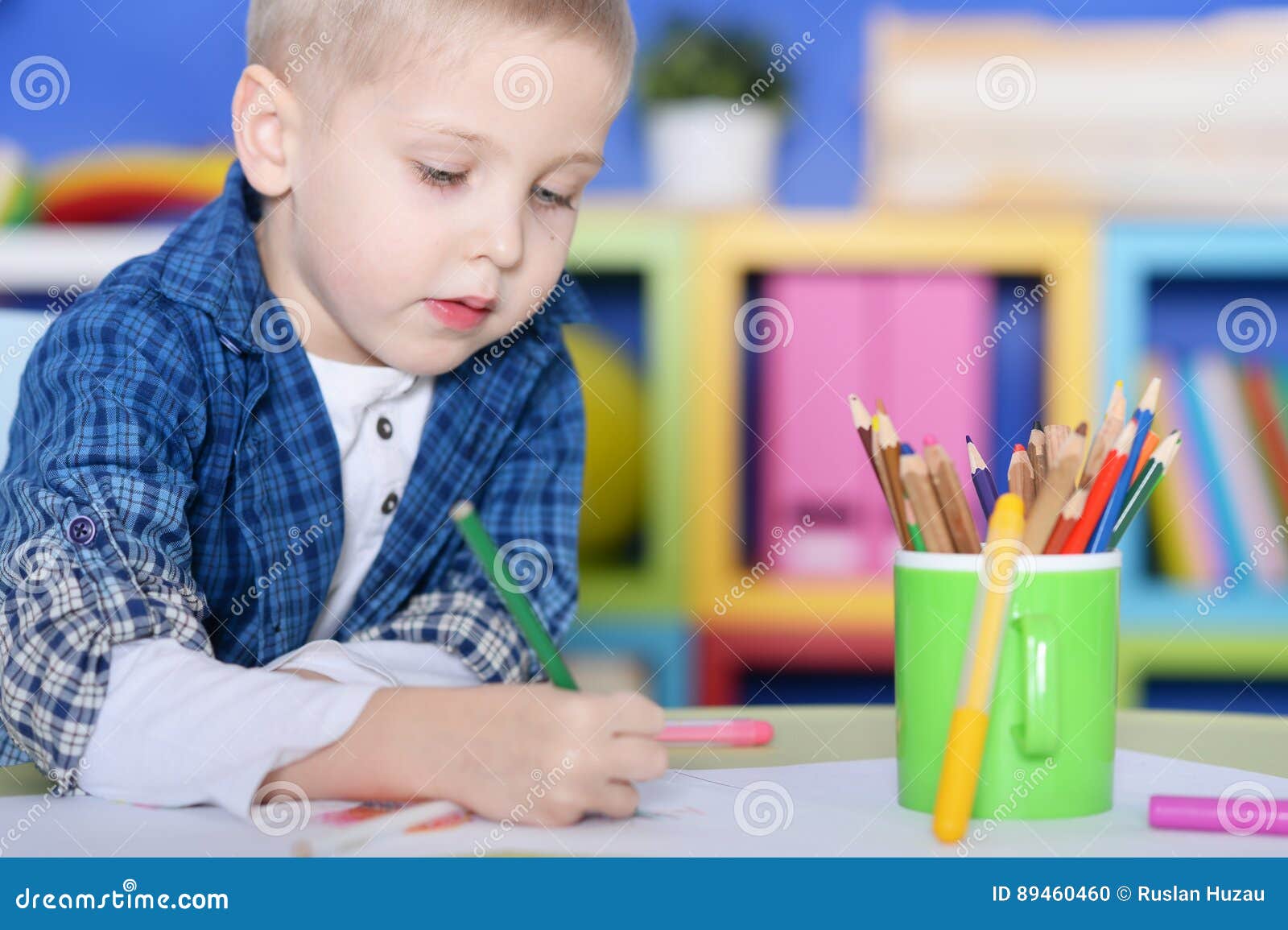 Boy drawing at the table stock photo. Image of caucasian - 89460460