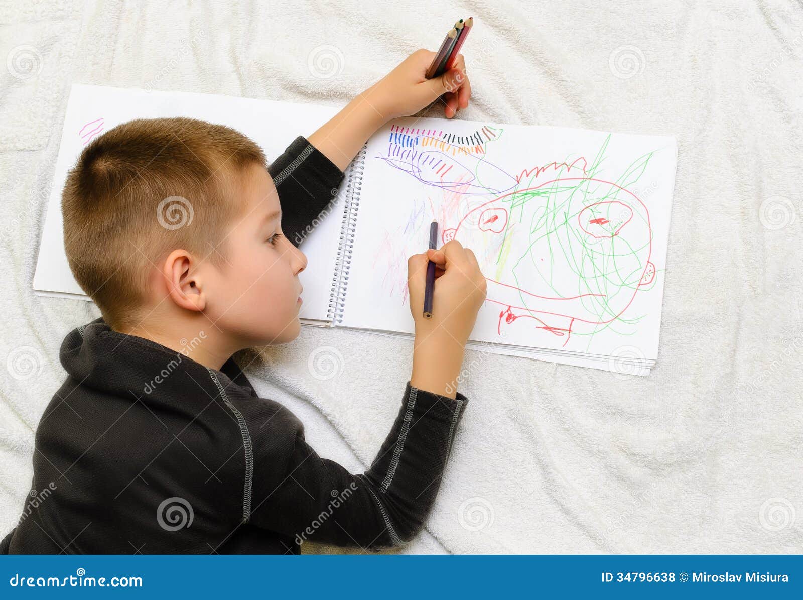 The boy draws stock photo. Image of copy, front, floor - 34796638
