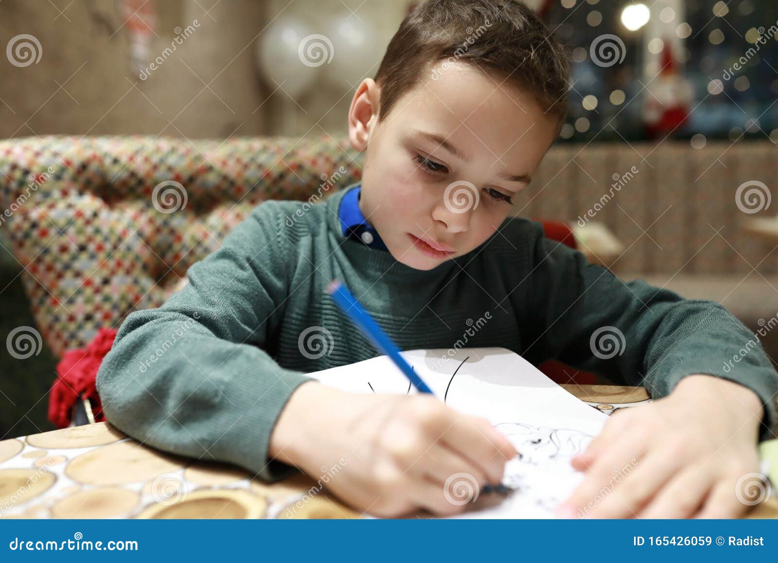 Boy draws with pencil stock image. Image of holiday - 165426059