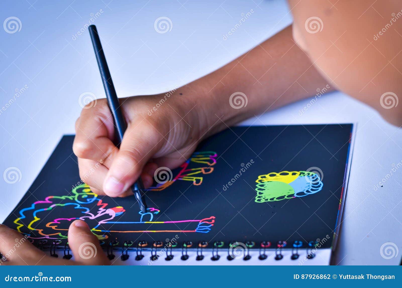 Boy Draws on a Scratch Note Colorful Stock Photo - Image of child, girl ...