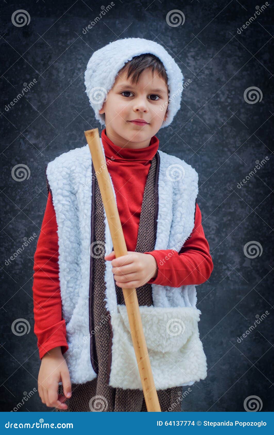 A Boy Dressed As A Shepherd Stock Photo | CartoonDealer.com #64137774