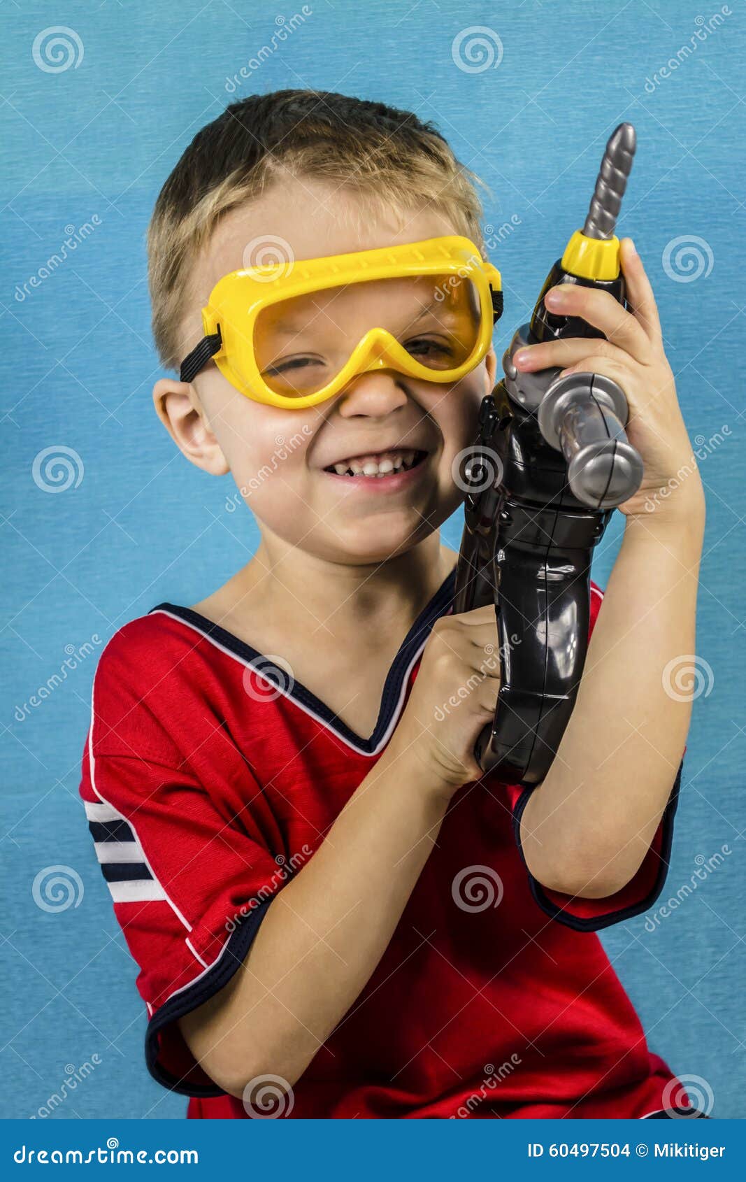 Boy and the drill stock photo. Image of repair, child - 60497504