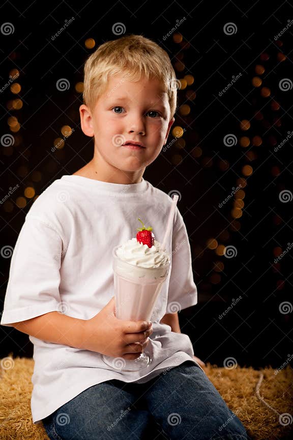 Boy drinking milk shake stock photo. Image of causcasion - 28864424