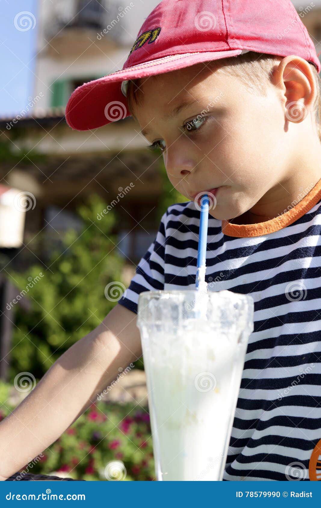Boy drinking milkshake stock photo. Image of gourmet - 78579990