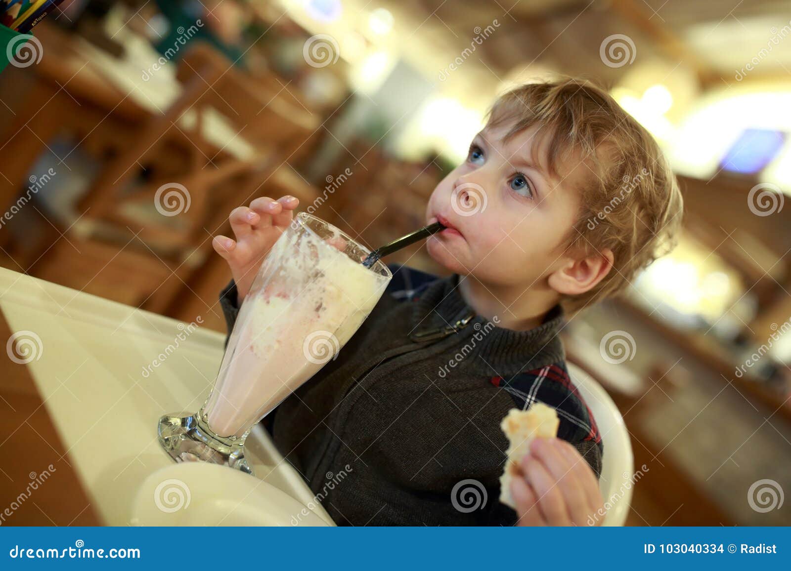 Boy drinking milkshake stock photo. Image of glass, hungry - 103040334