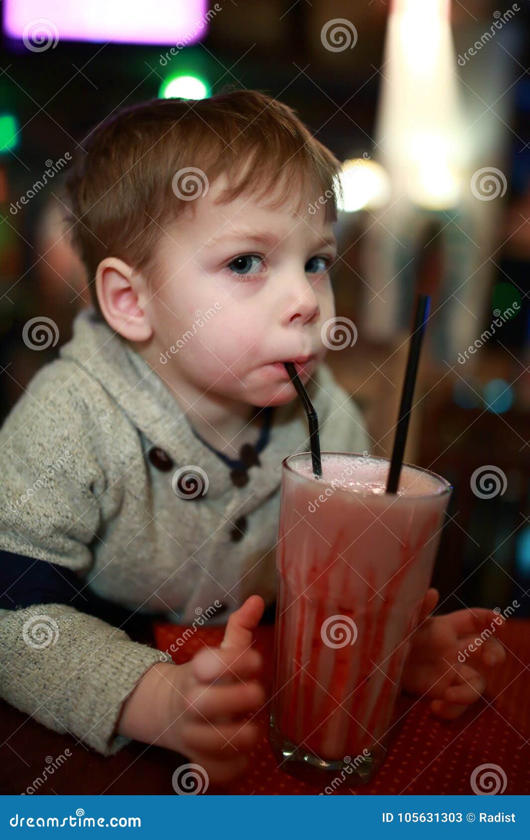 Boy drinking milkshake stock image. Image of glass, dessert - 105631303
